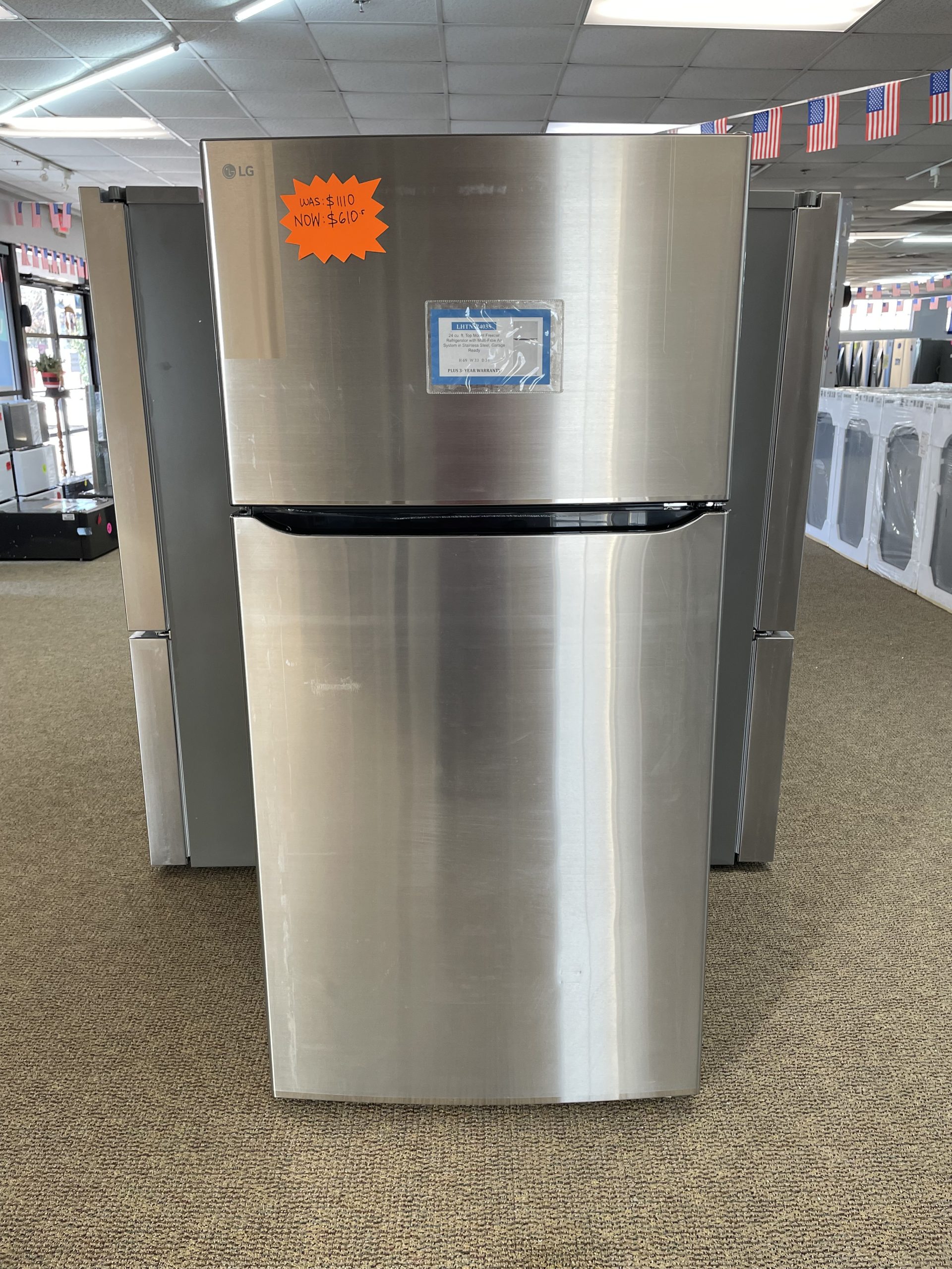 24 cu. ft. Top Mount Freezer Refrigerator with Multi-Flow Air System in ...